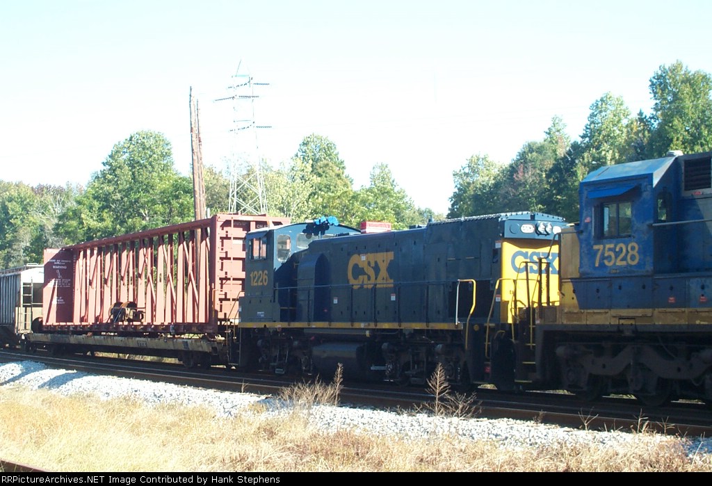 CSX 1226 on Lineville Sub train in LaGrange--unit was freshly overhauled and painted out of Waycross